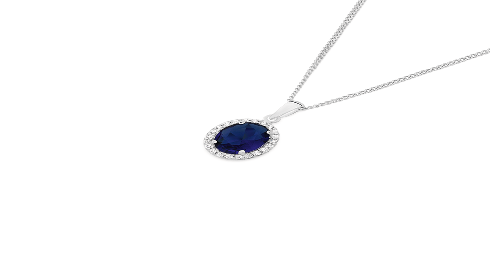 Sterling Silver Blue Oval & Cz 10mm Halo Pendant in Blue | Angus & Coote
